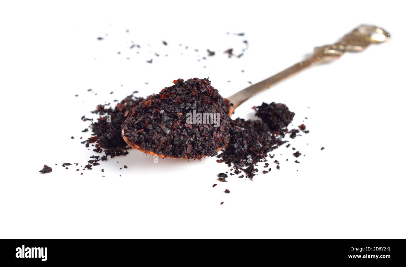 Urfa biber also known as isot pepper isolated on white Stock Photo - Alamy
