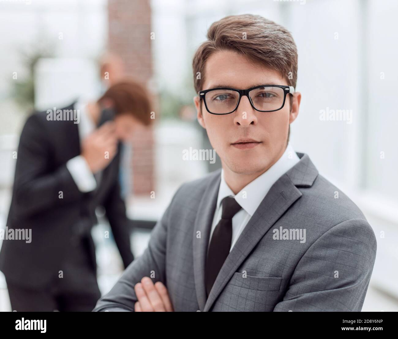 successful business man standing in a modern office Stock Photo - Alamy