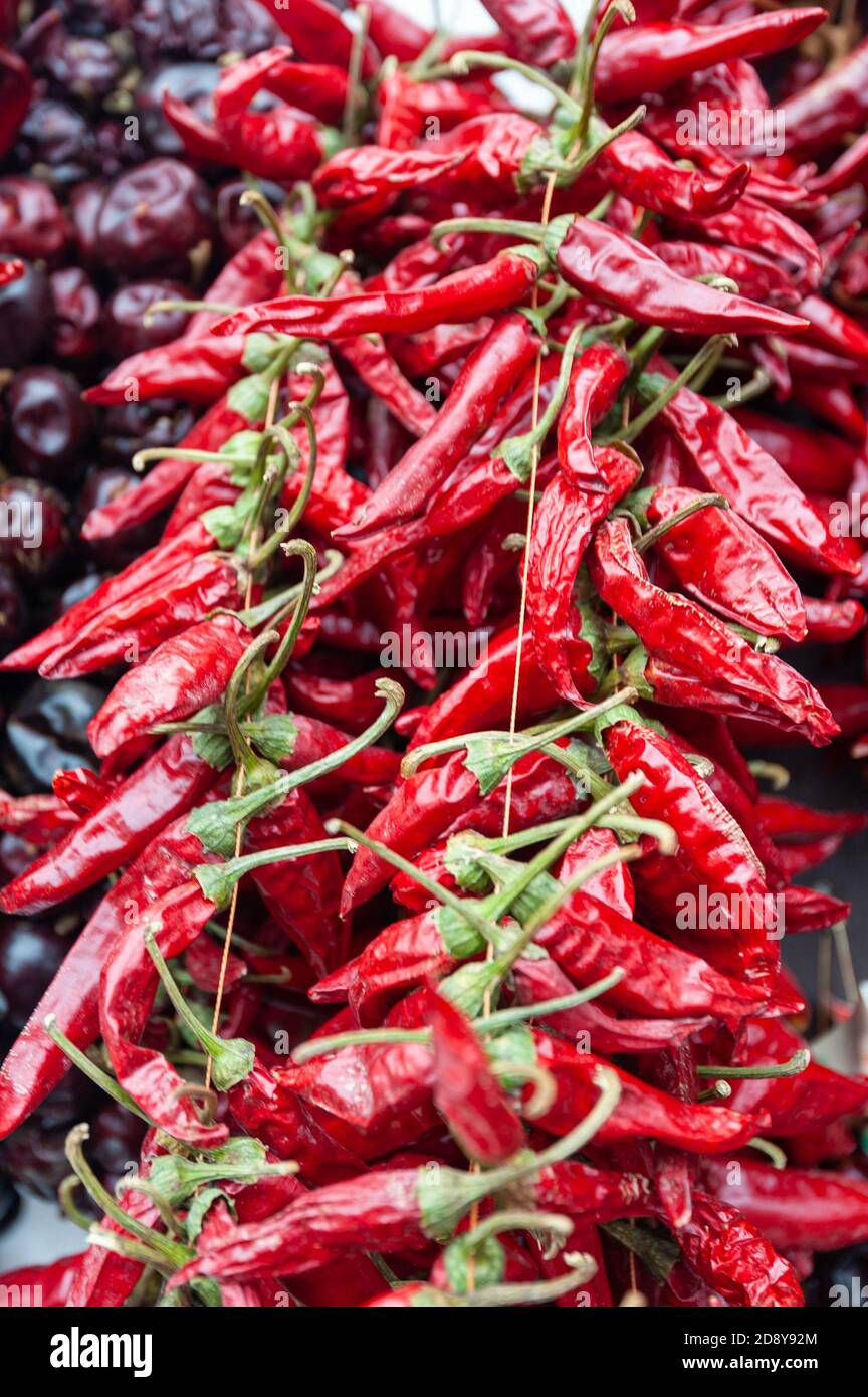 Dried red chili paprika hang in bunch . Food, organic Stock Photo - Alamy