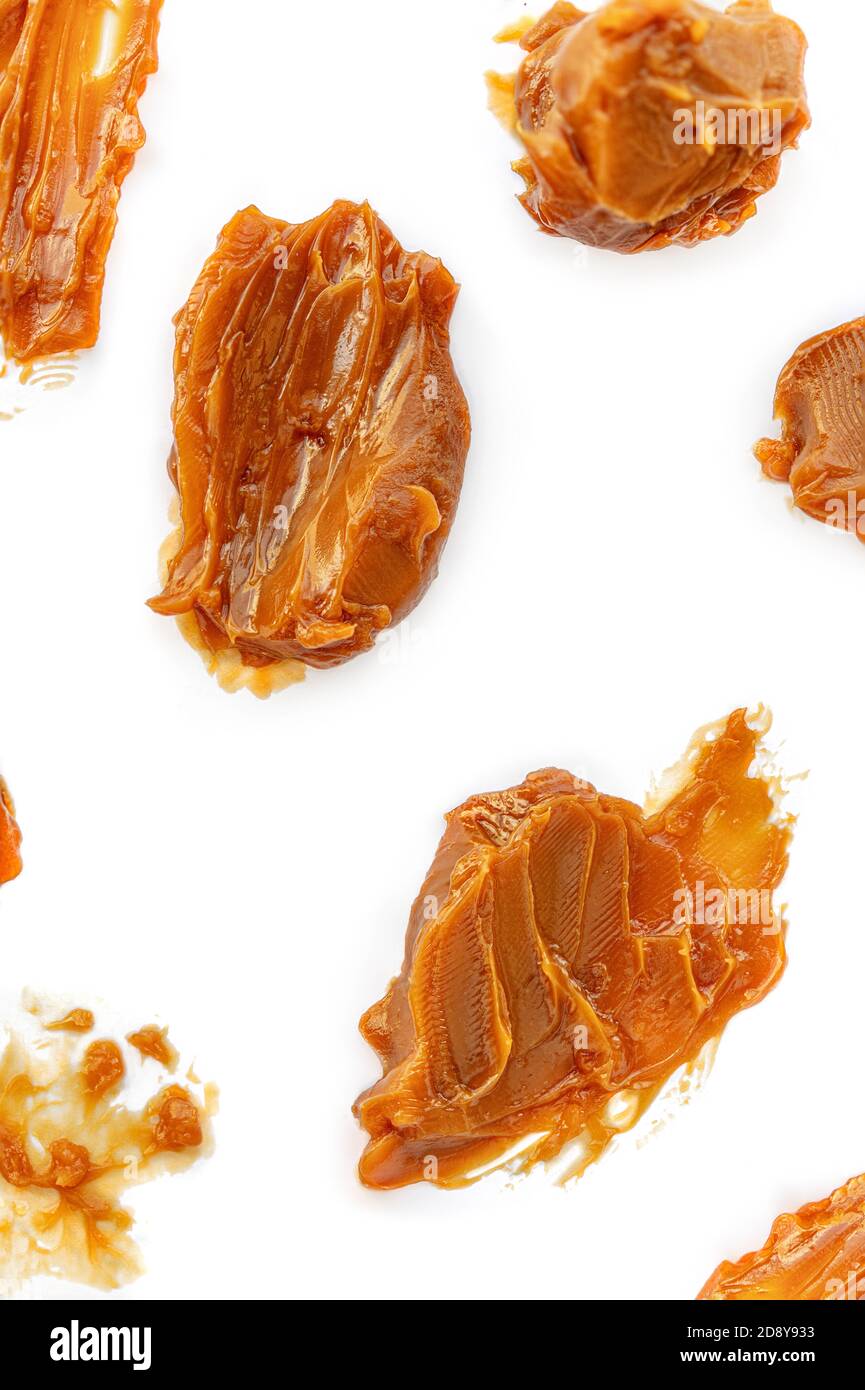 Caramel Pattern. Soft melted caramel isolated on white background, top ...