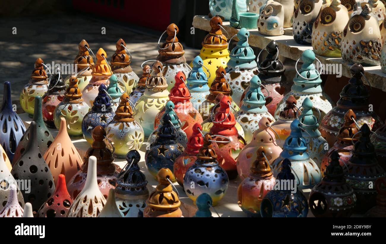 Colorful handmade ceramic candlesticks for sale Stock Photo - Alamy