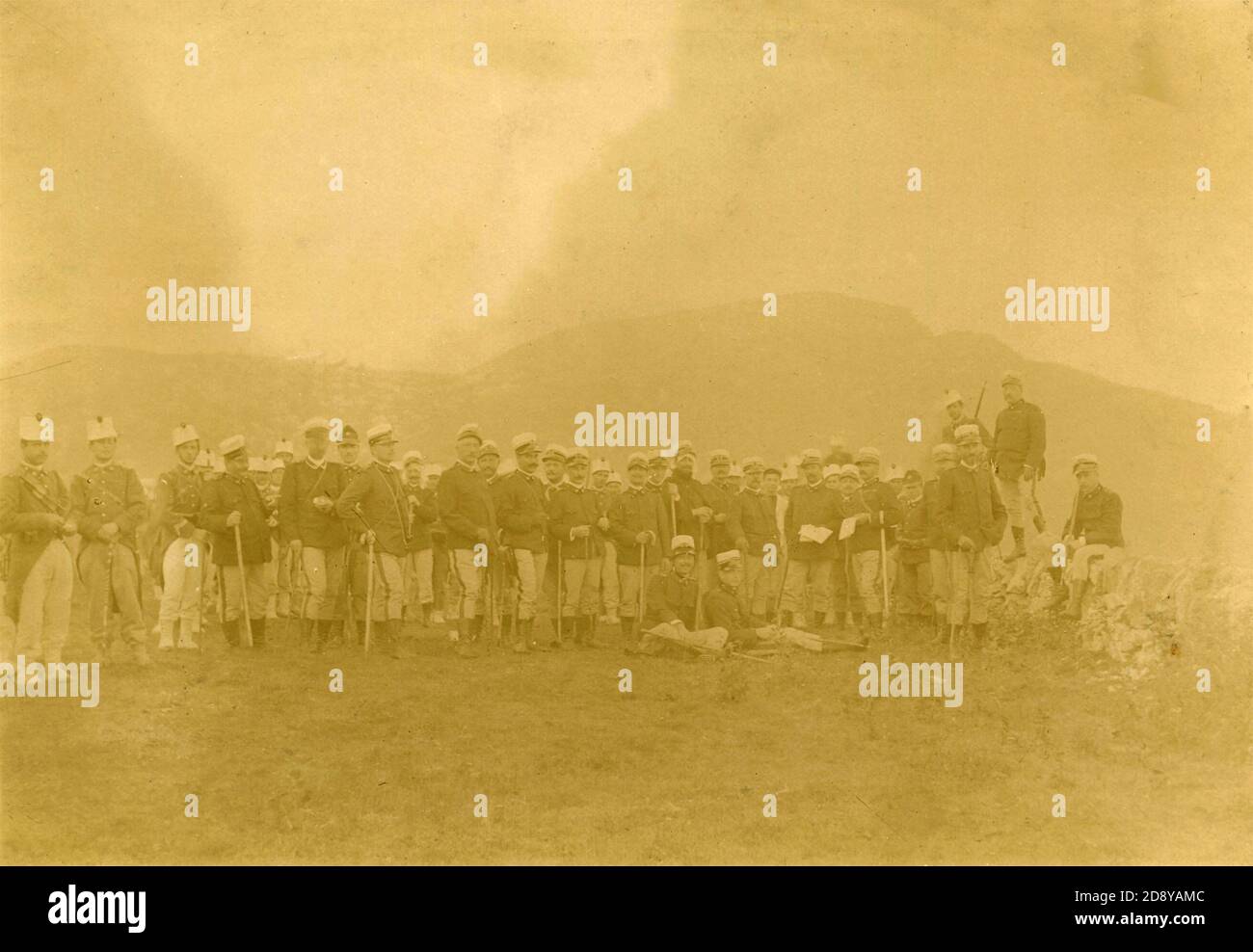 Old army of uniformed soldiers resting in the field, 1880s Stock Photo ...