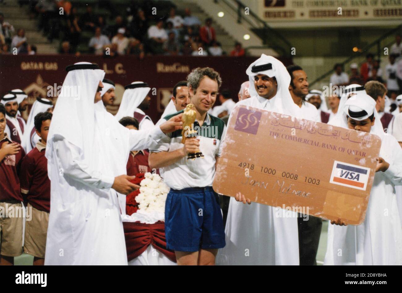 American tennis player John McEnroe holds the golden eagle and the ...