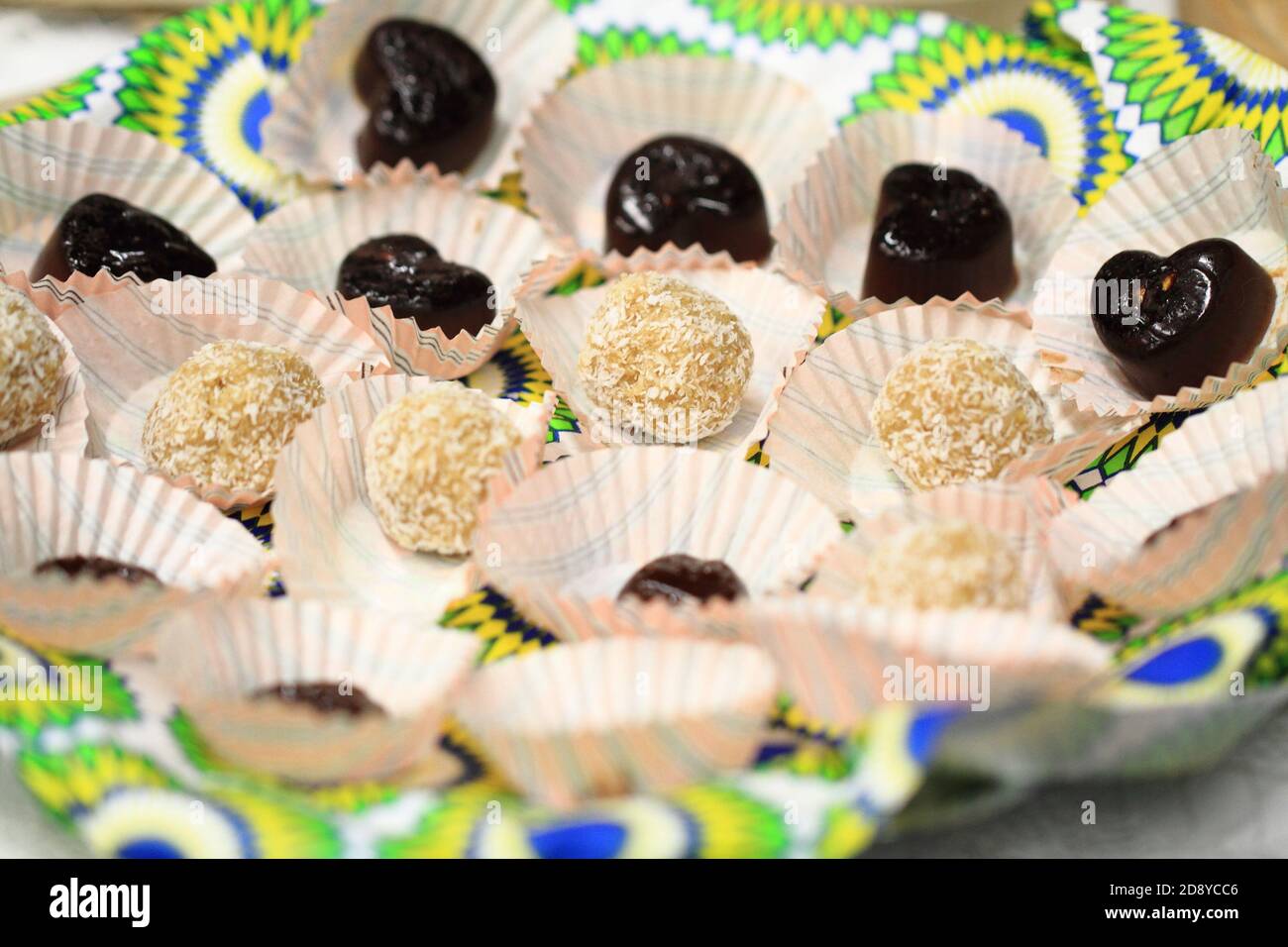 coconut spheres and chocolate dessert as nice sweet background Stock ...