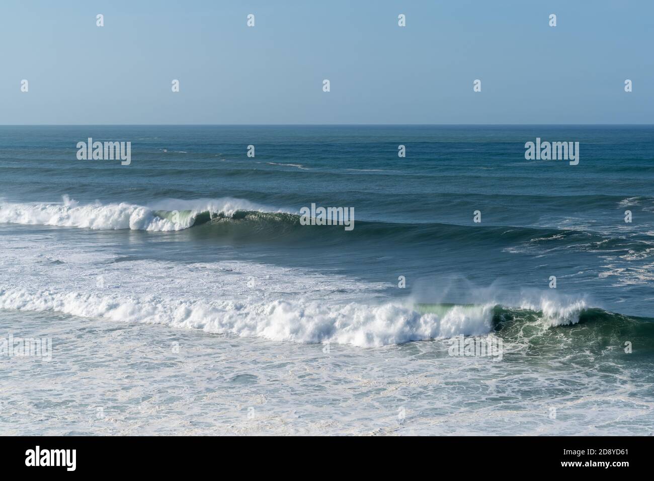 Detail view of large waves breaking in the open ocean during a tropical ...