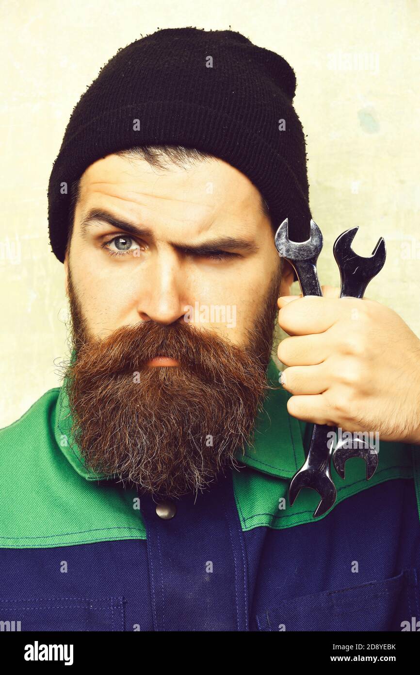 Bearded man, long beard. Brutal caucasian mechanic, unshaven hipster in ...