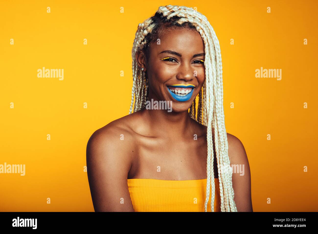 Yellow braids female hi-res stock photography and images - Alamy