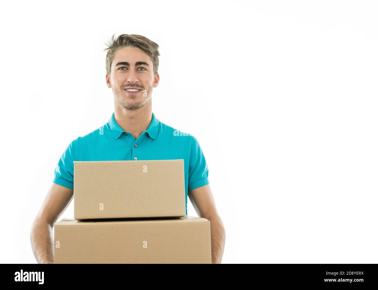 Boy carrying boxes of cardboard with things to send to transport ...