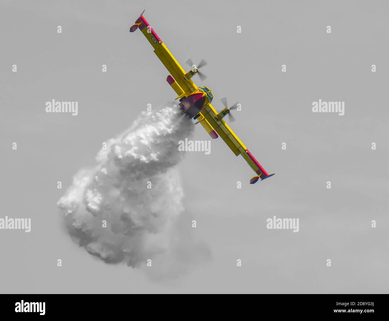 Firefighter Plane Dropping Water in Switzerland Stock Photo - Alamy