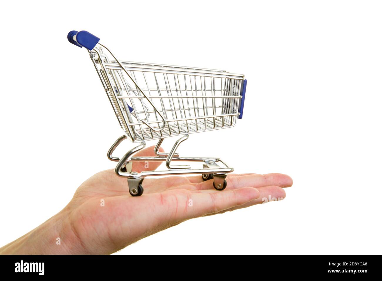 Hand with a shopping cart Stock Photo - Alamy