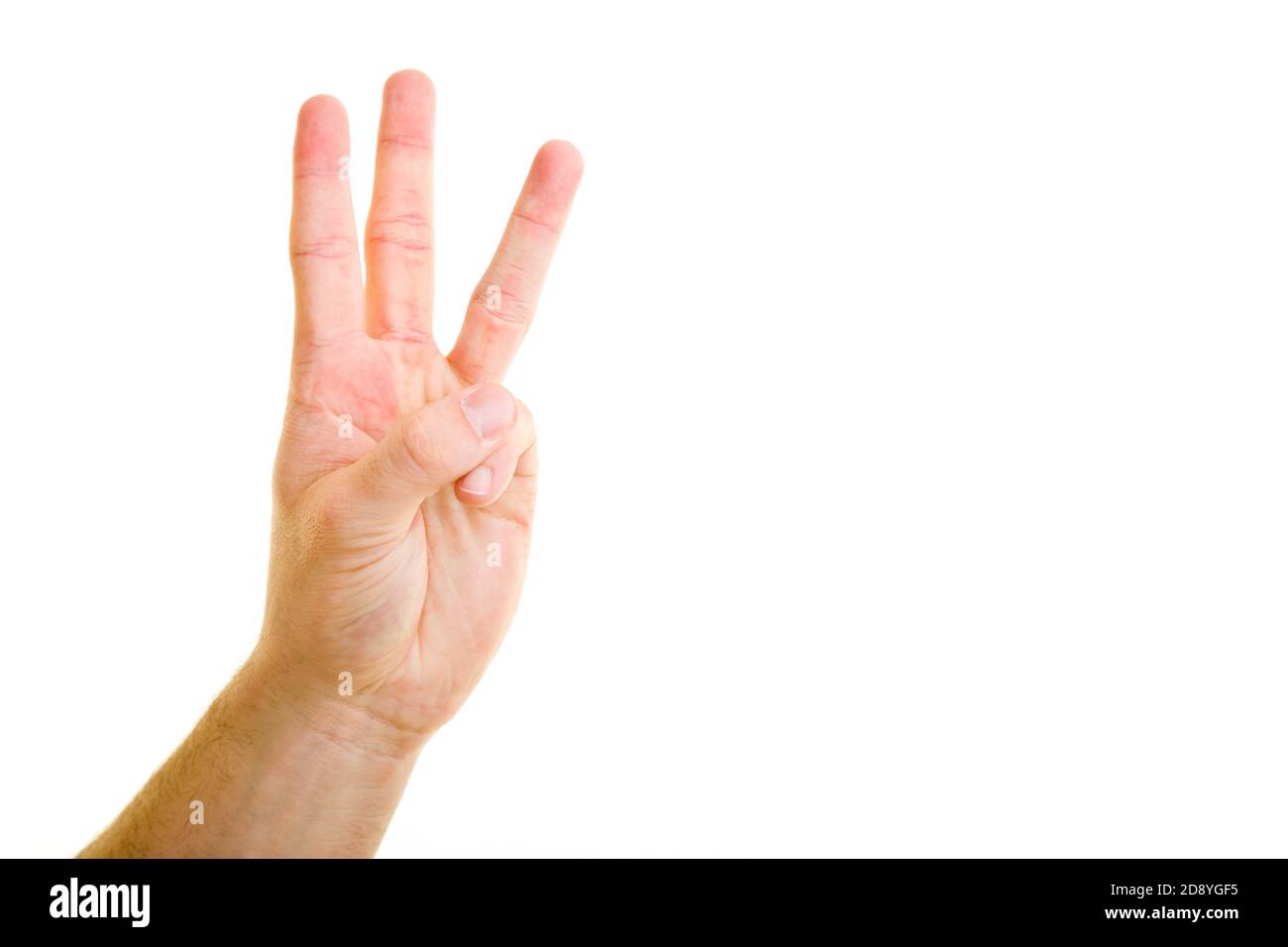 Hand shows three fingers Stock Photo - Alamy