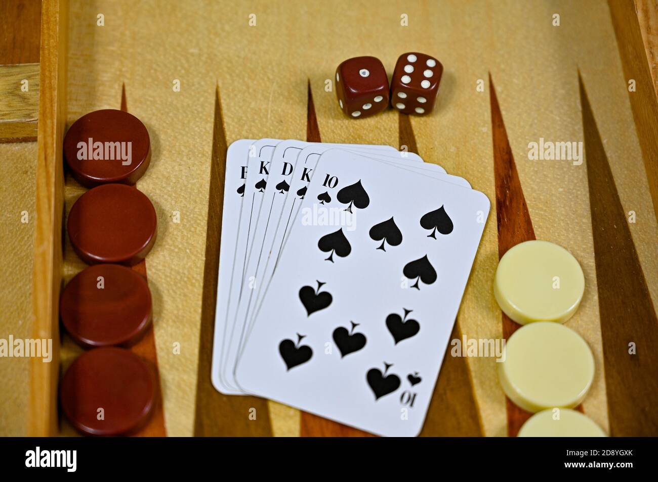 backgammon board with game pieces cards and dices Stock Photo - Alamy
