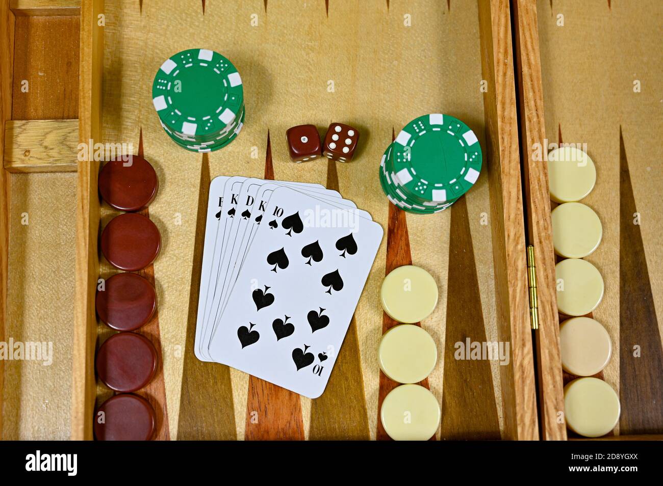 backgammon board with game pieces cards and dices Stock Photo - Alamy