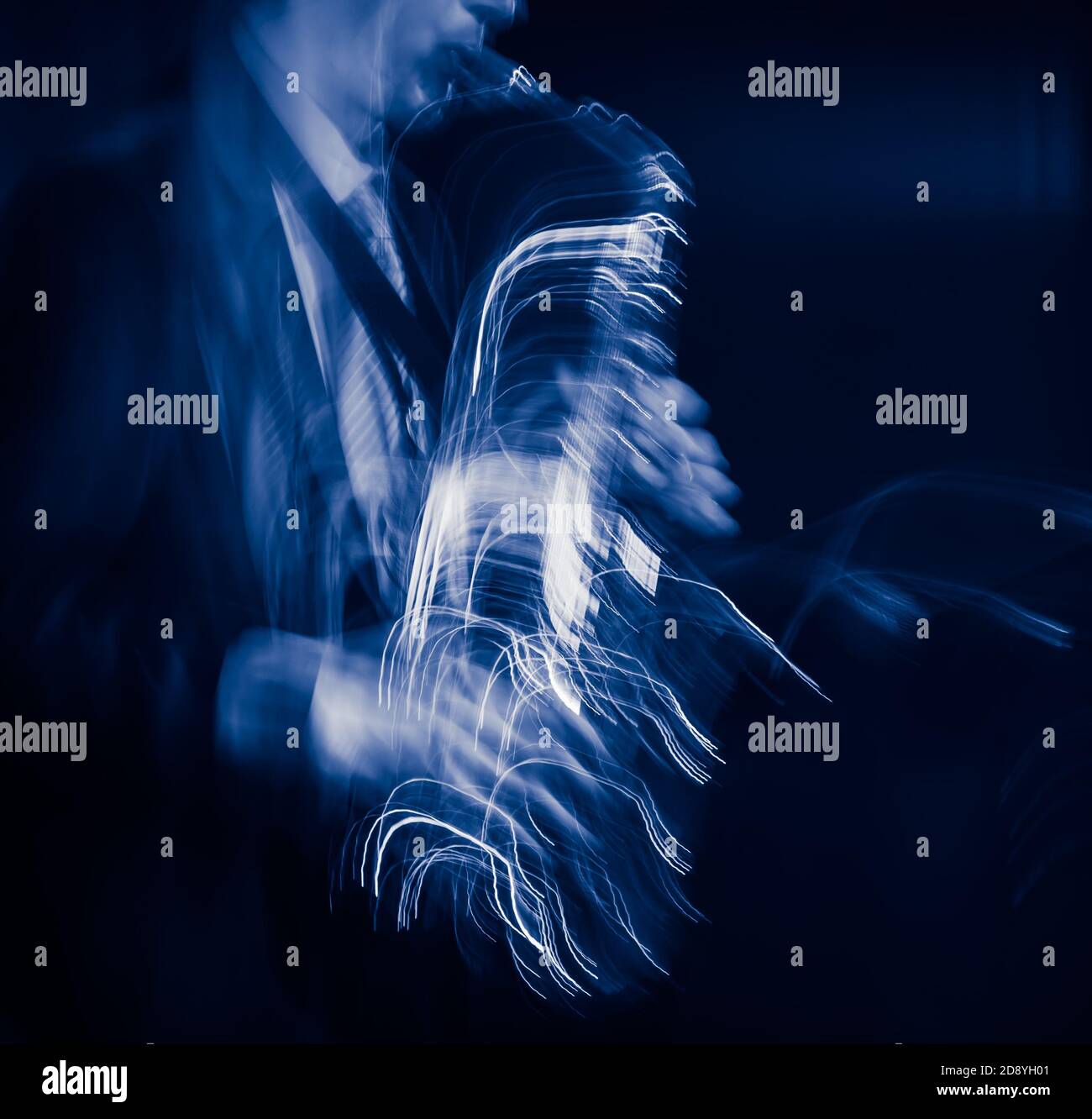 Jazz music concept. Saxophone player performing on stage. Sax player ...