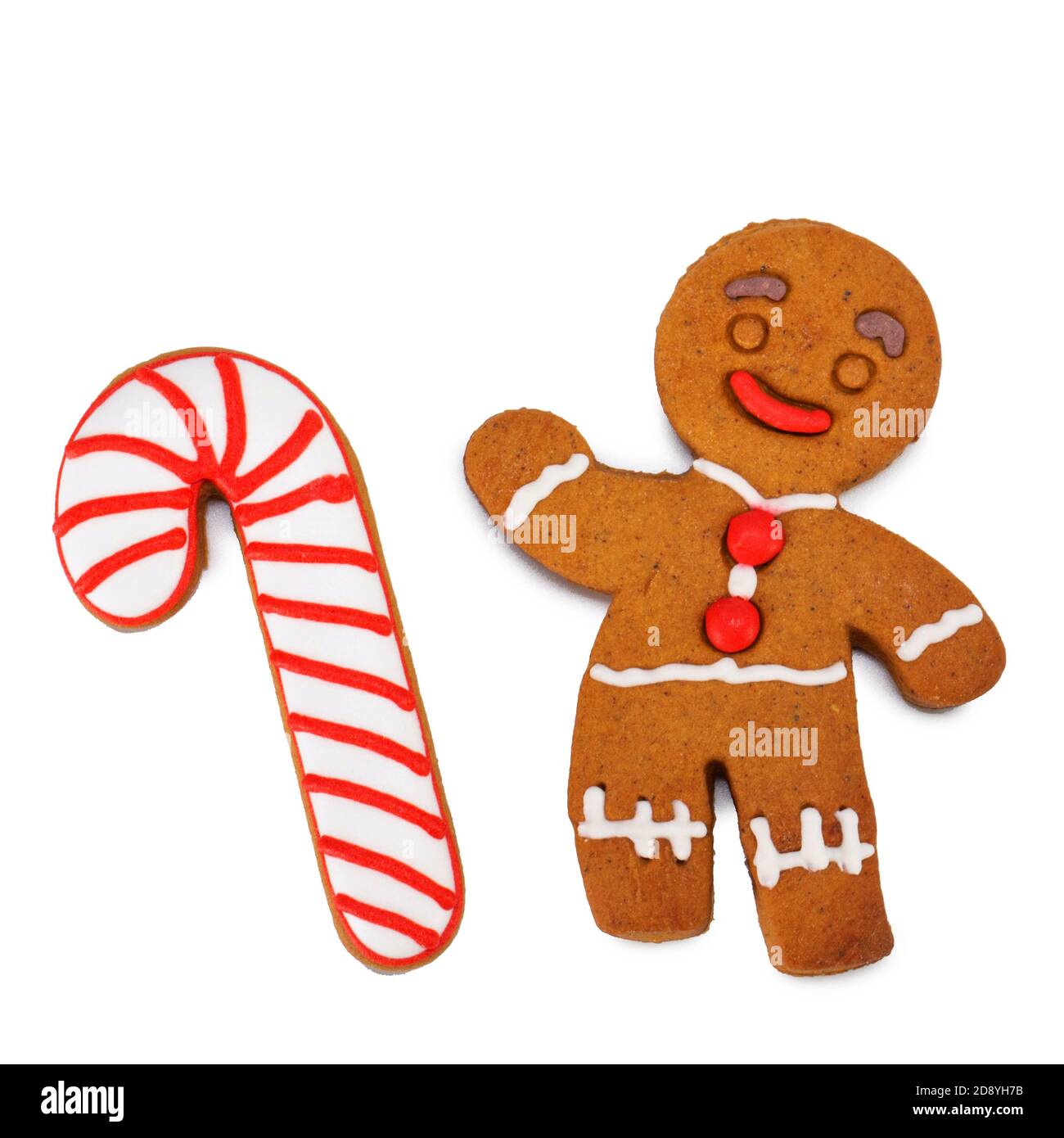 Christmas gingerbread man and candy cane decorated with color glaze ...