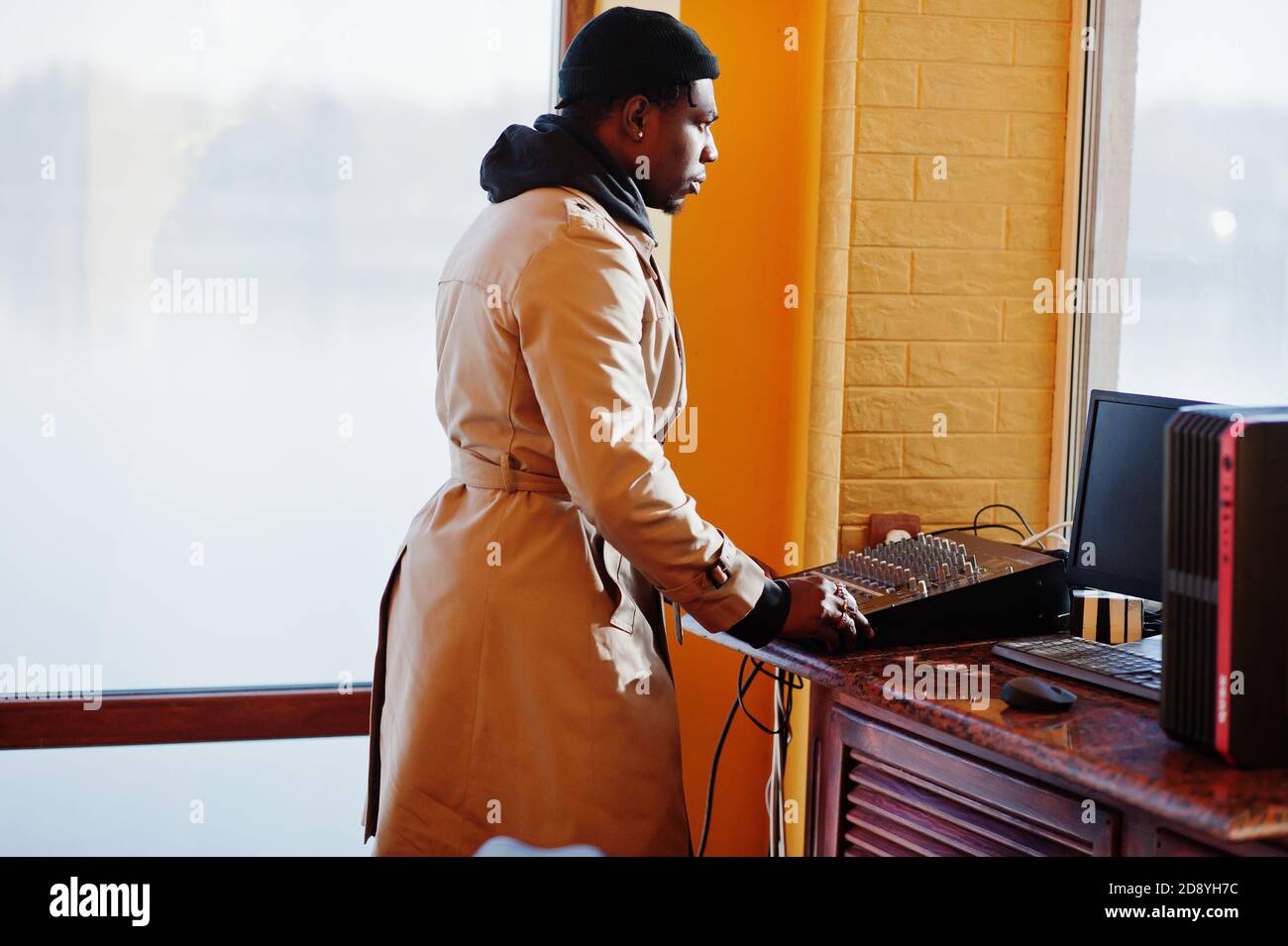African american young sound producer working at studio Stock Photo - Alamy