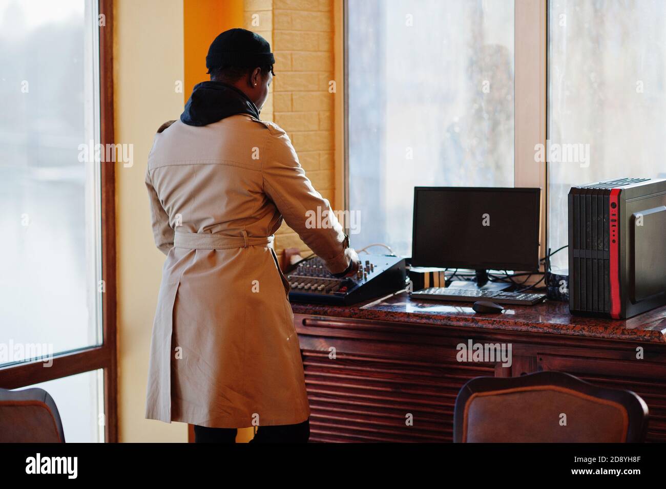 African american young sound producer working at studio Stock Photo - Alamy