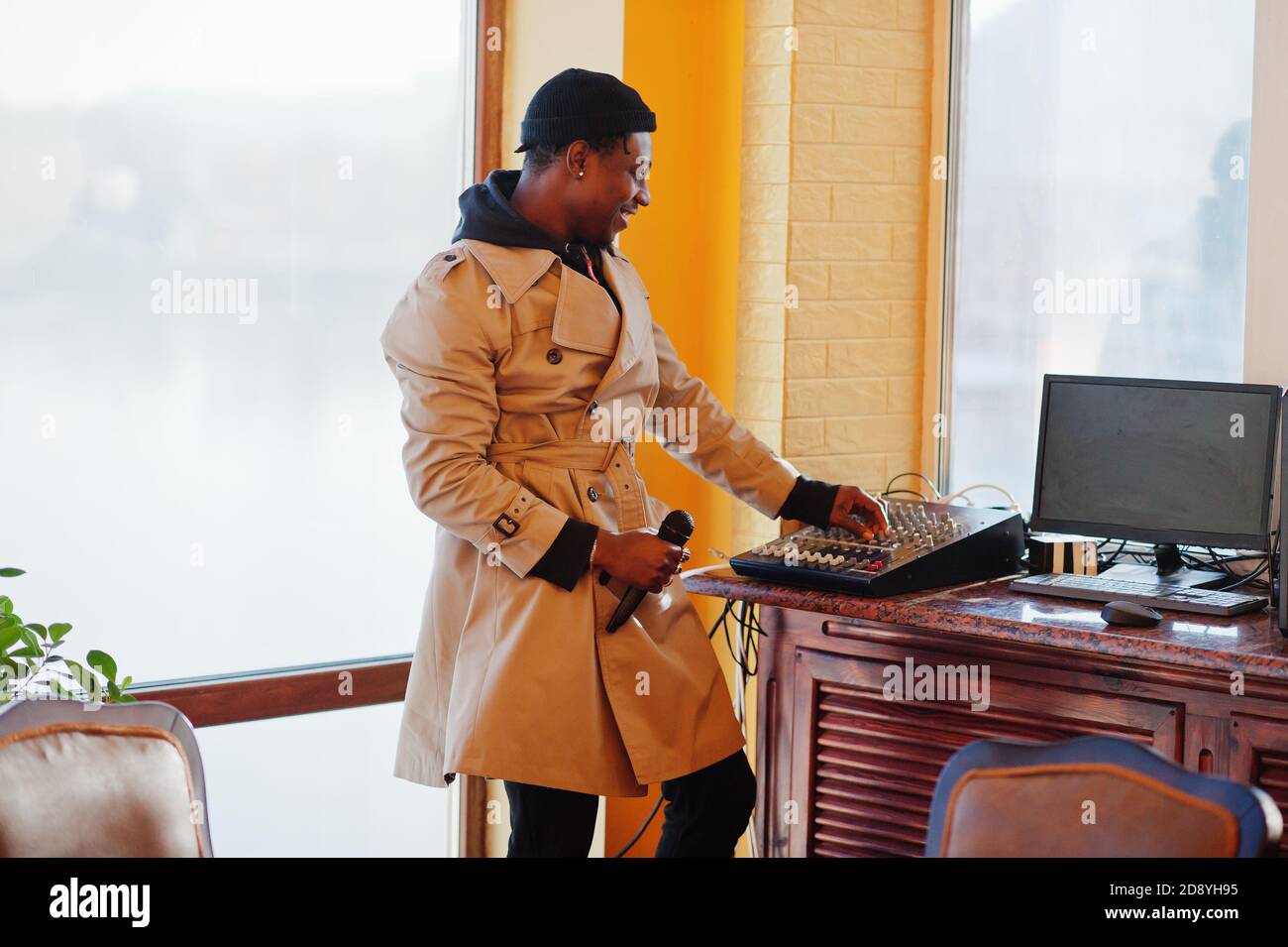 African american young sound producer working at studio Stock Photo - Alamy