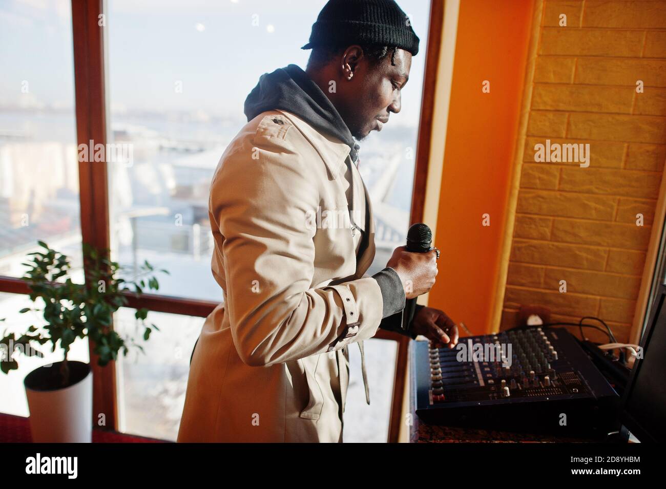 African american young sound producer working at studio Stock Photo - Alamy