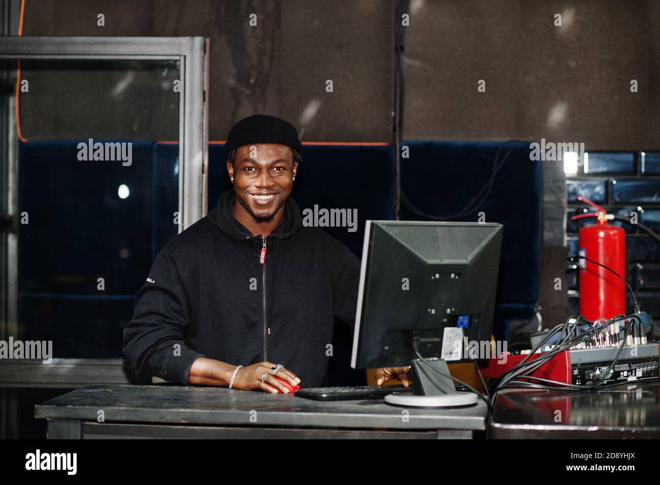 African american young sound producer working at studio Stock Photo - Alamy