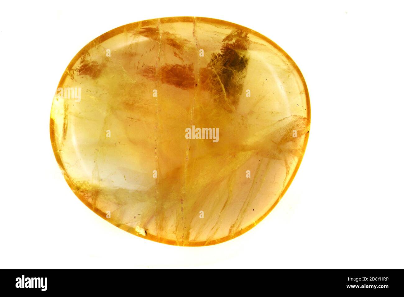 yellow amber mineral isolated on the white background Stock Photo - Alamy