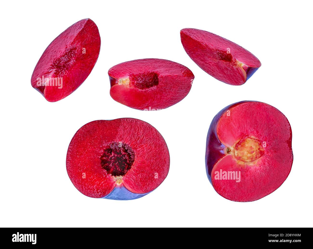 Set of ripe purple plum fruits isolated on white background. Halved ...