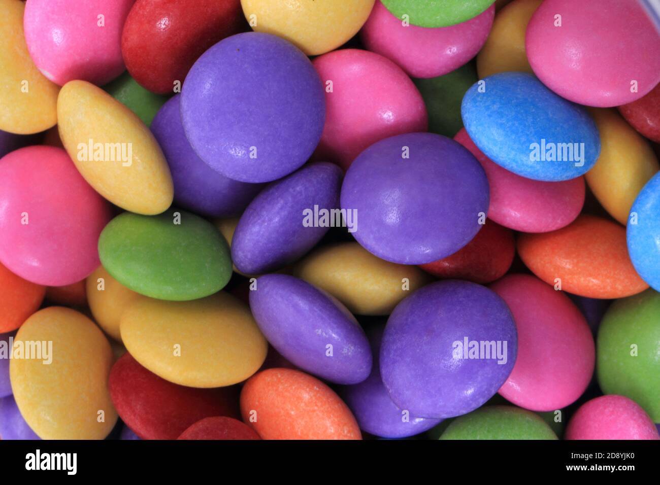 sweet color candies texture as food background Stock Photo - Alamy
