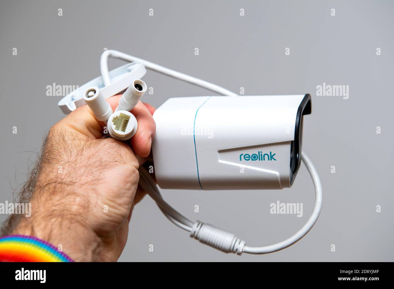Paris, France - Oct 24, 2020: POV male hand holding against white ...