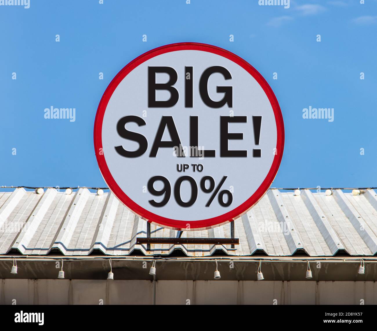 A Circle billboard with text shows BIG SALE is installed on a roof ...