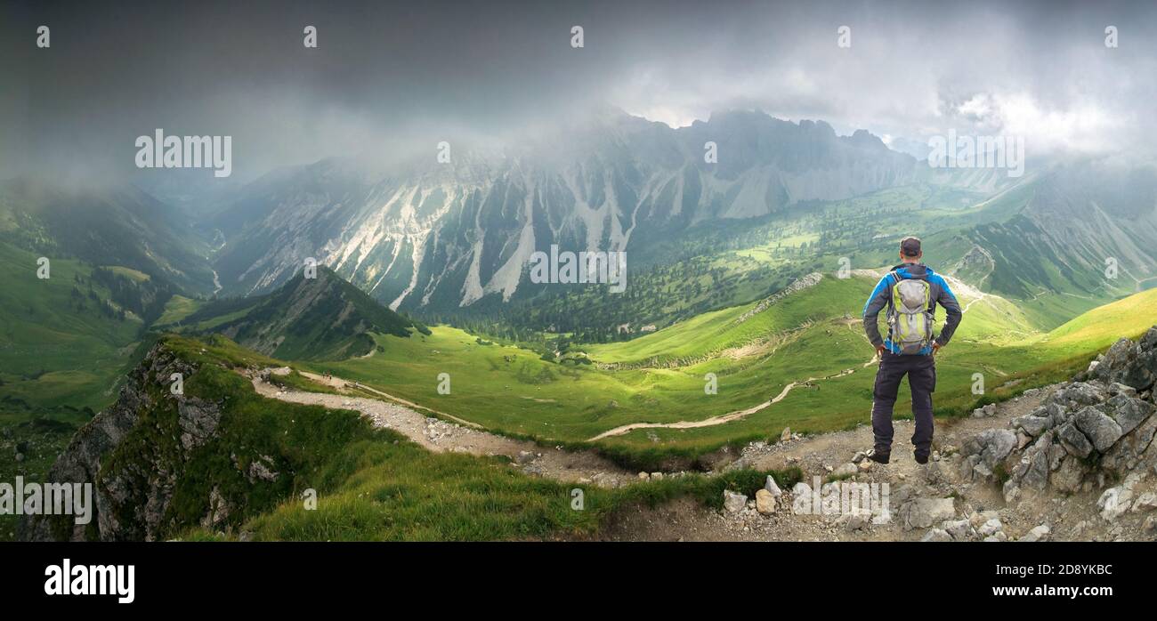 Person standing above clouds, landscape hi-res stock photography and ...