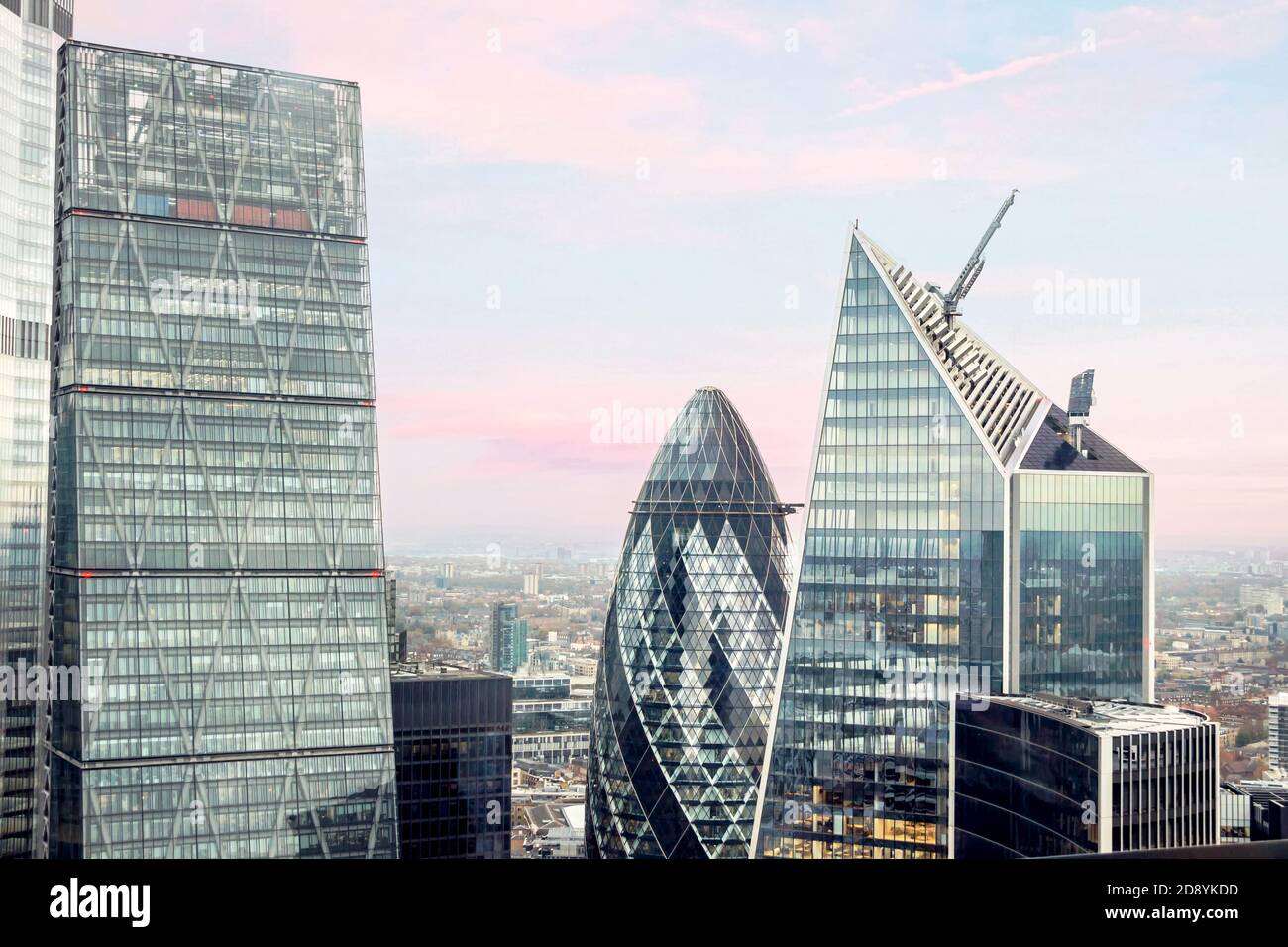 cityscape of modern gherkin building with blue sky at central London ...
