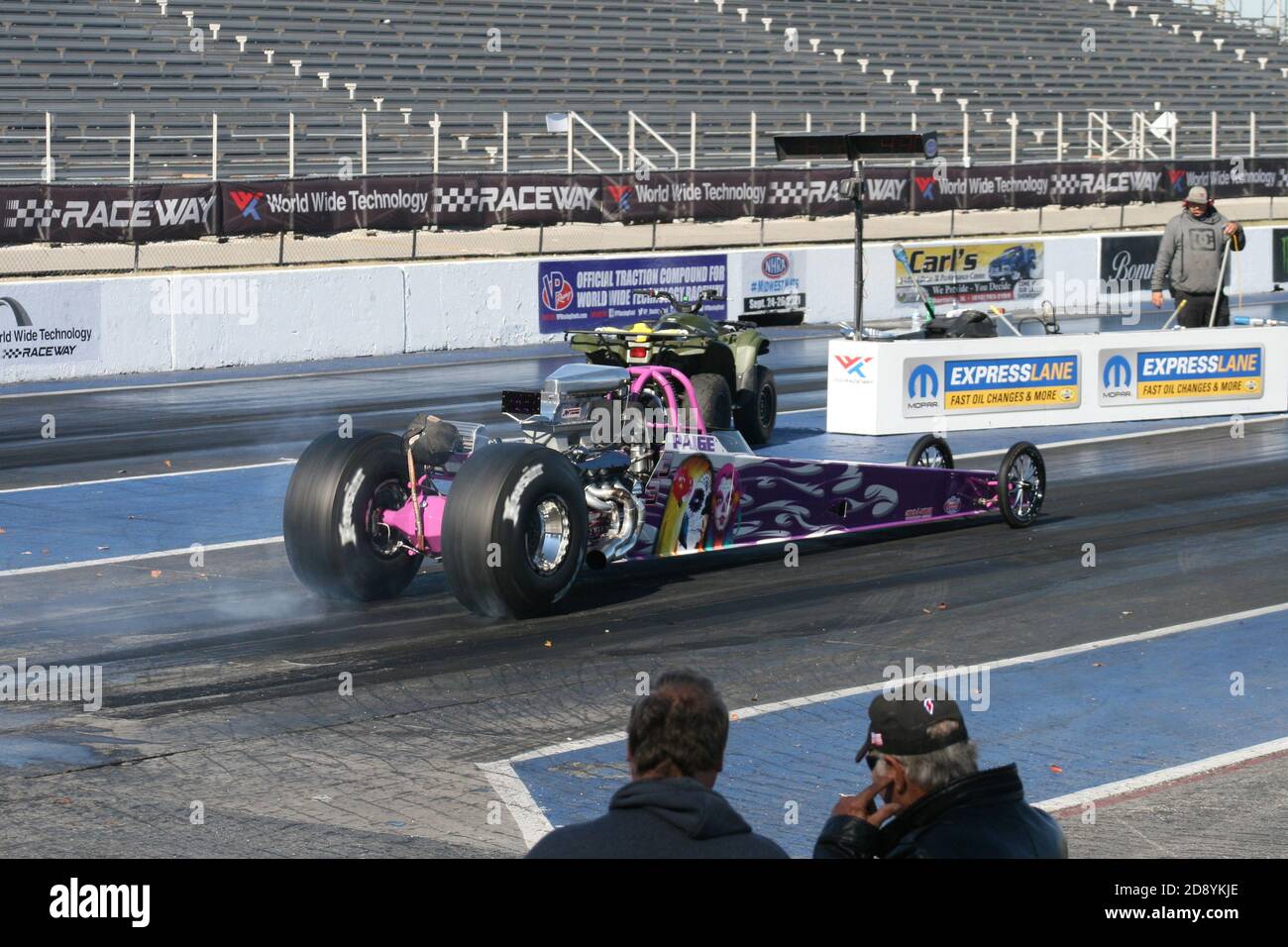 Dragsters heat the tires before staging at Worldwide Technology Raceway ...