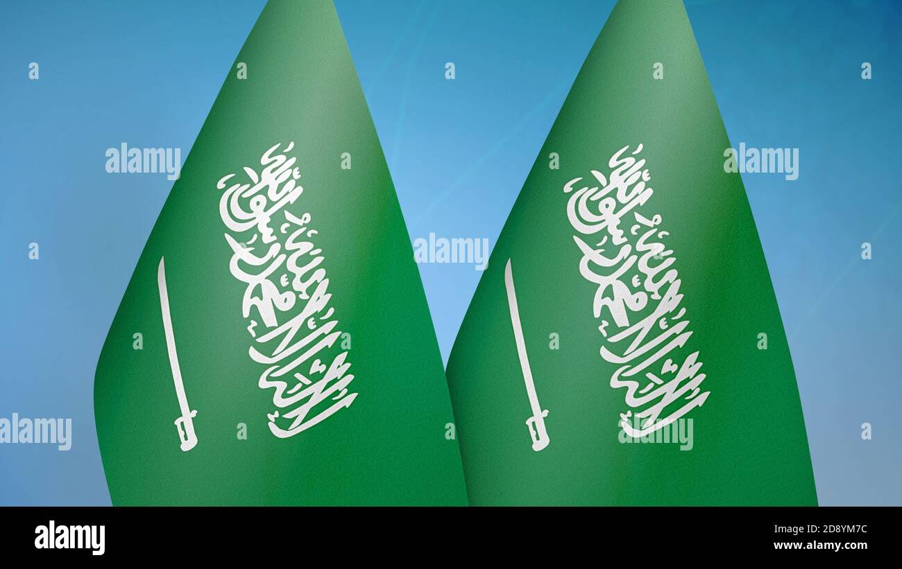 Saudi Arabia two flags blue background Stock Photo - Alamy