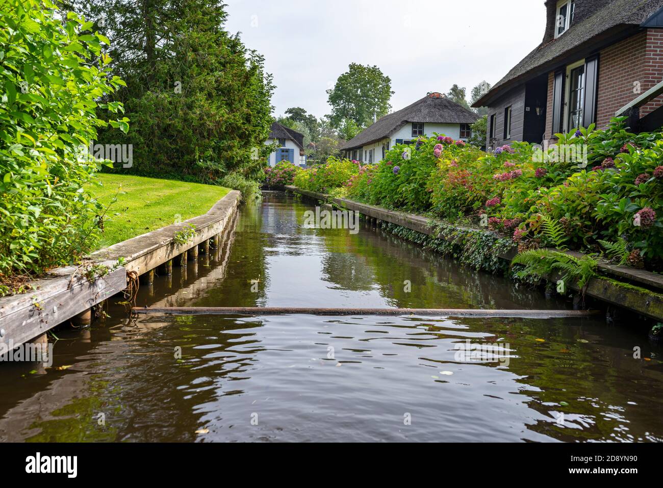 A canal flowing between buildings in a famous village in the ...