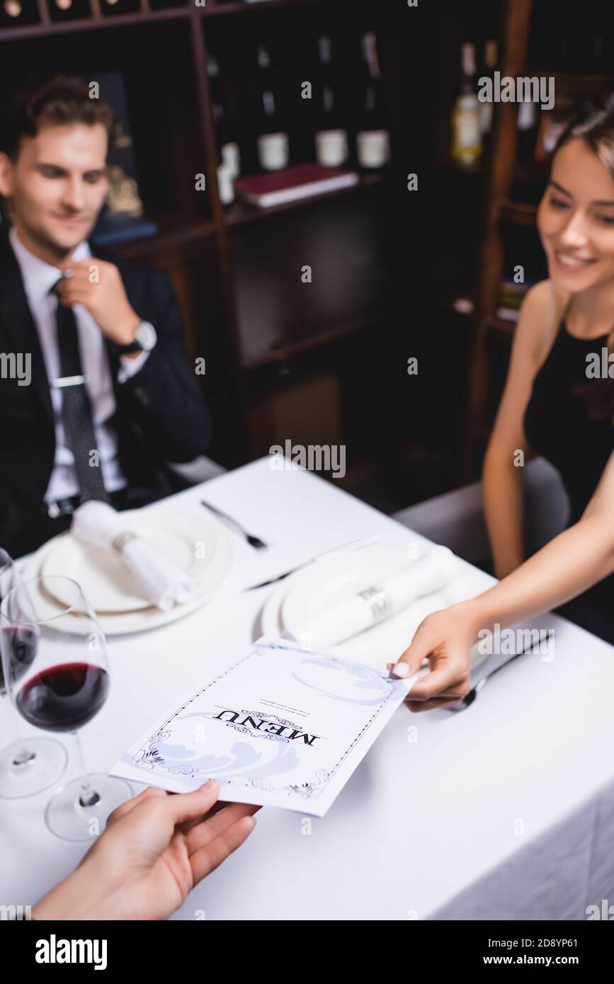 Woman at table in restaurant hi-res stock photography and images - Alamy