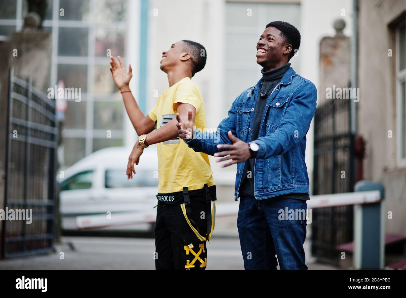 Two happy guys dancing hi-res stock photography and images - Alamy