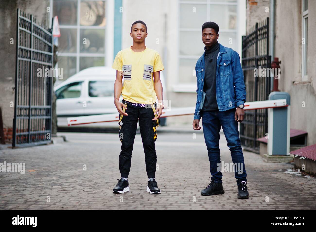 Two african male friends talking together Stock Photo - Alamy
