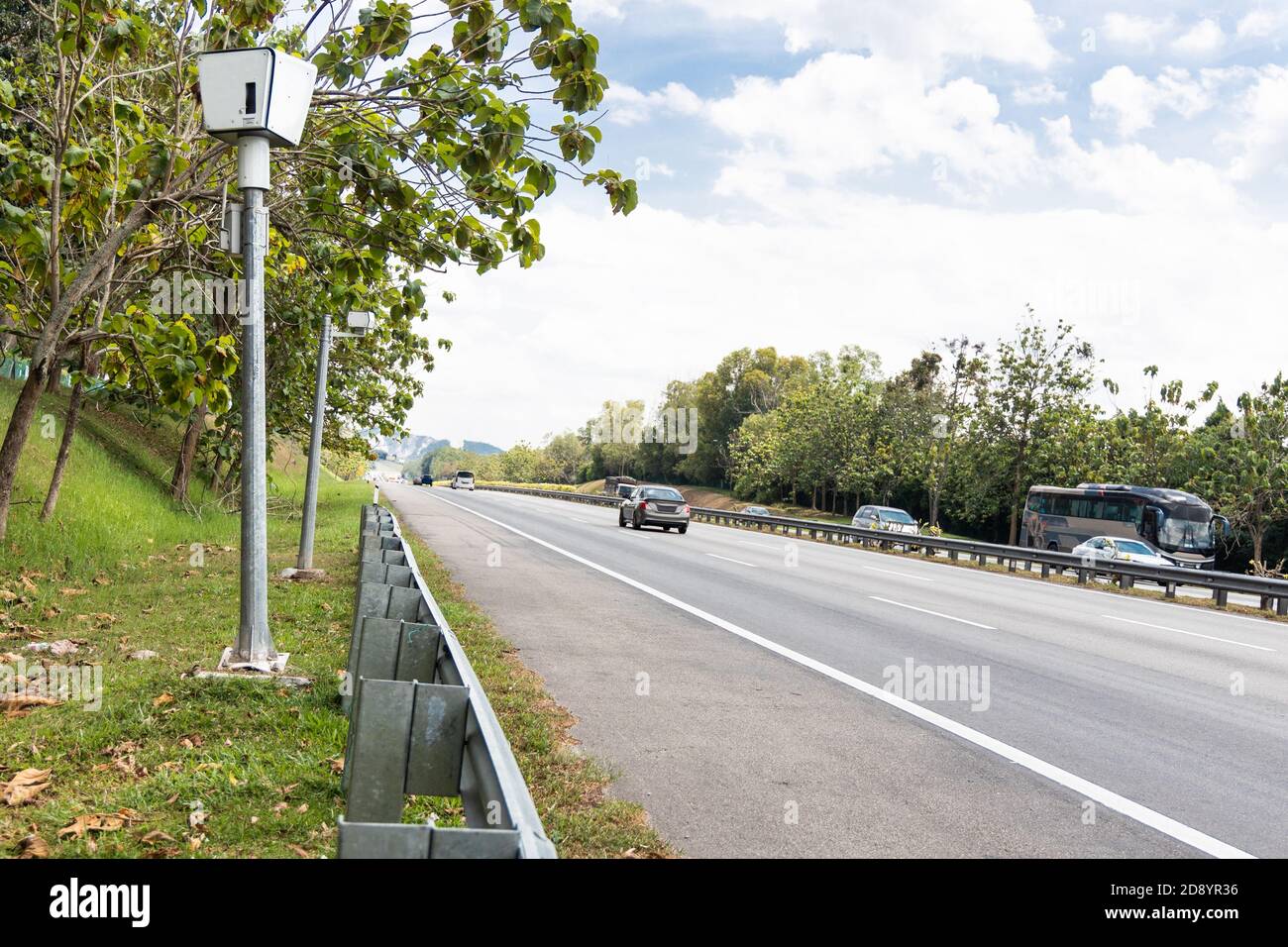 Speed trap surveillance camera along highway to control speeding Stock ...