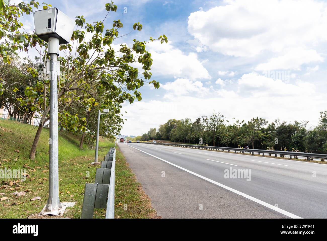 Speed trap surveillance camera along highway to control speeding Stock ...