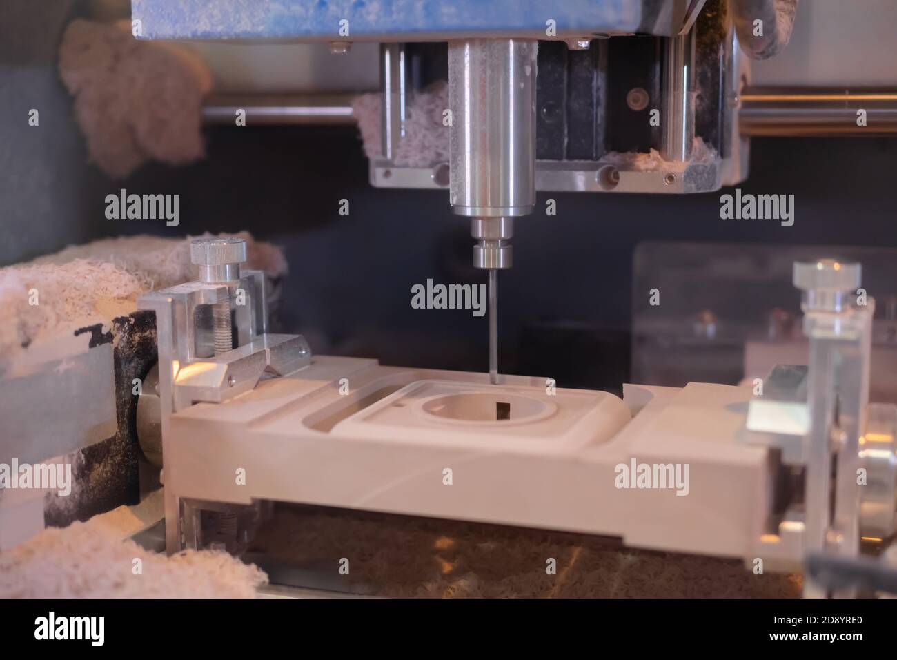 Automated cnc milling machine cutting wooden workpiece from wood pulp ...