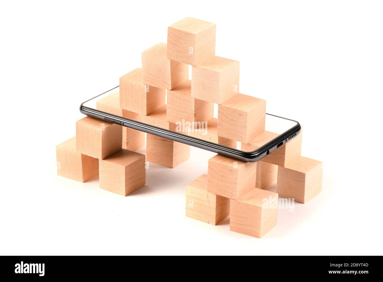 Black mobile smartphone and wooden cubes. Smartphone with blank screen ...