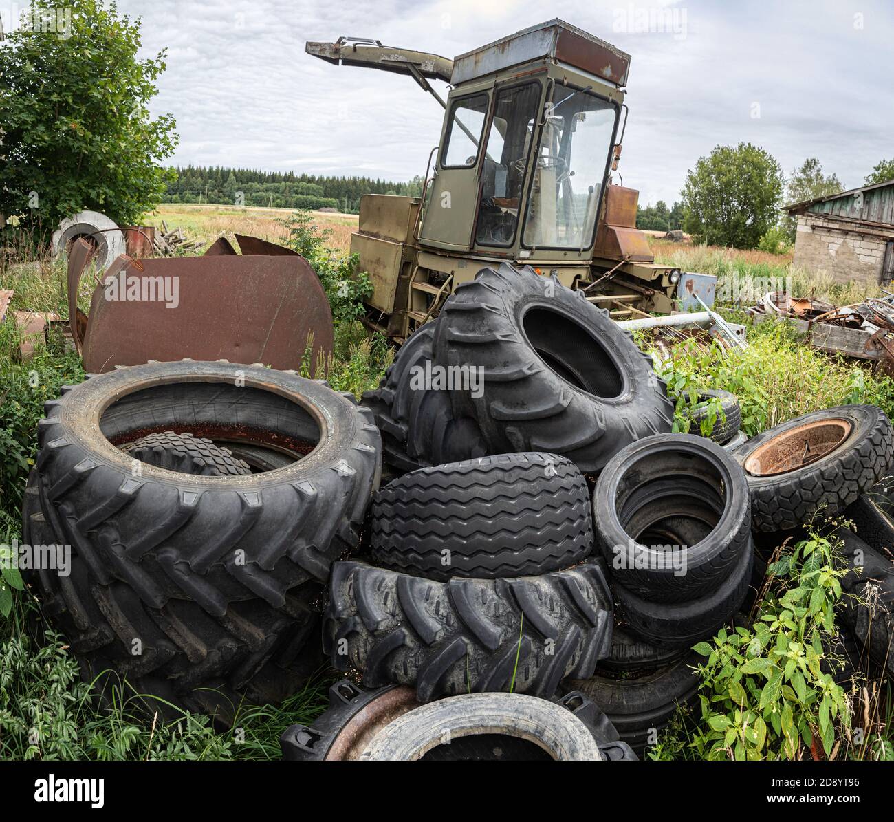 Ecological concept. Old used tires in a scrap metal dump Stock Photo ...