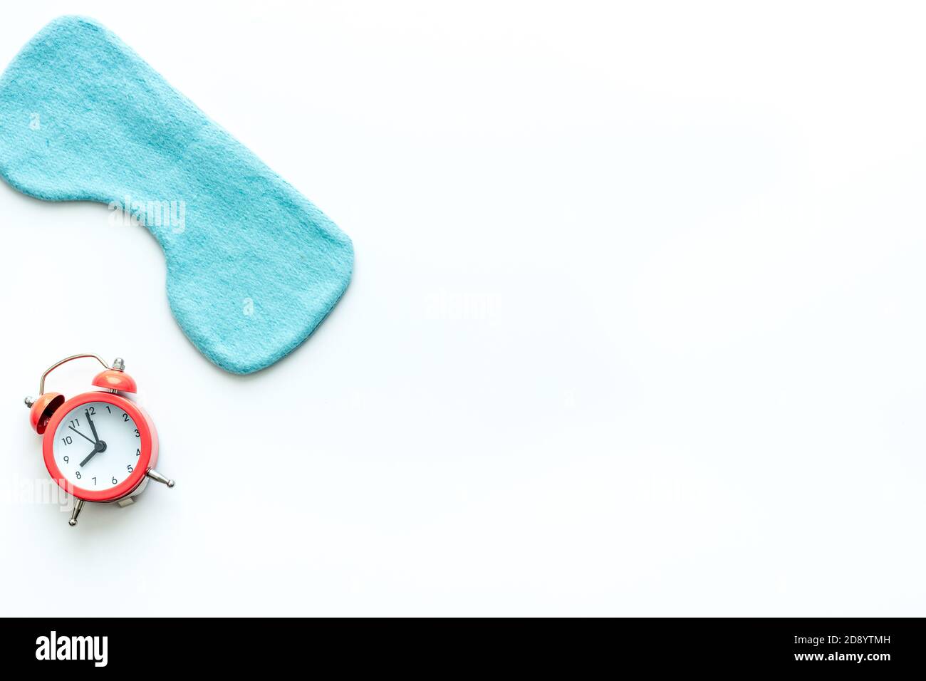 Sleep well concept. Sleeping mask with alarm clock, flat lat,top view ...