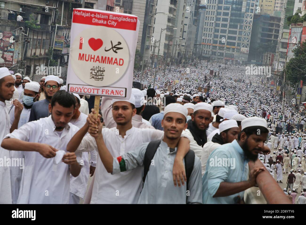 A protester displays a placard reading ''I love Prophet Muhammad ...