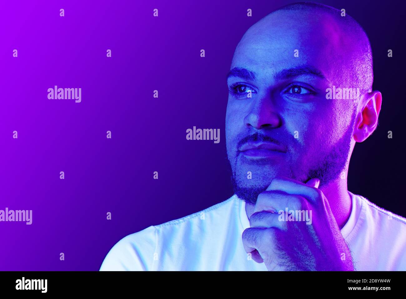 Serious thoughtful black guy portrait in neon light Stock Photo - Alamy Serious thoughtful black guy portrait in neon light Stock Photo - Alamy