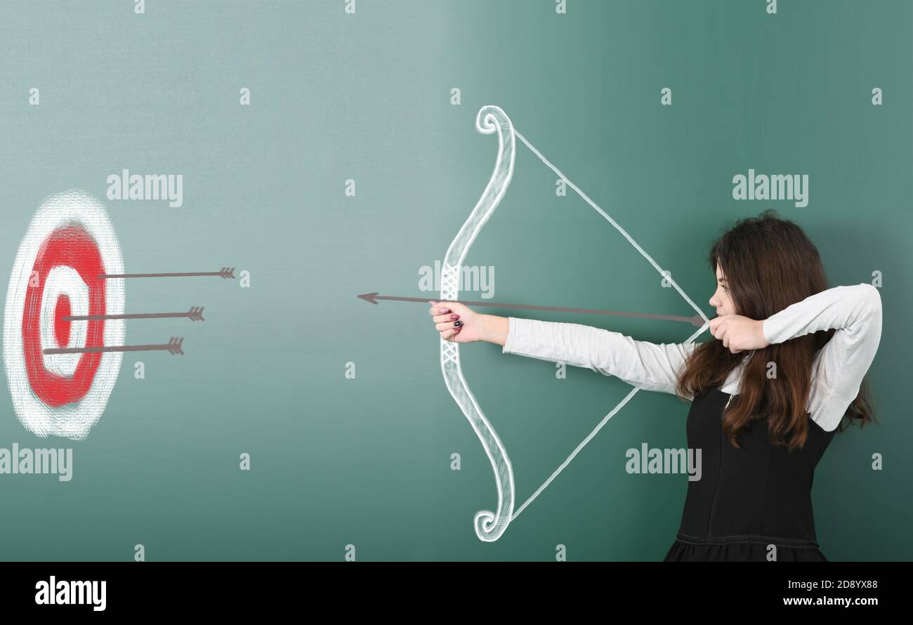 Girl shoots an arrow hi-res stock photography and images - Alamy