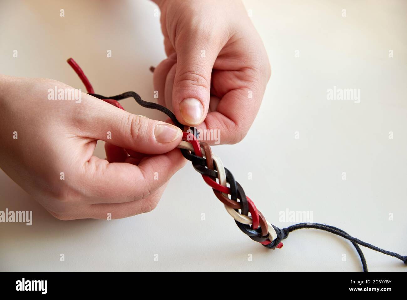 Girl hobby making bracelet hi-res stock photography and images - Alamy