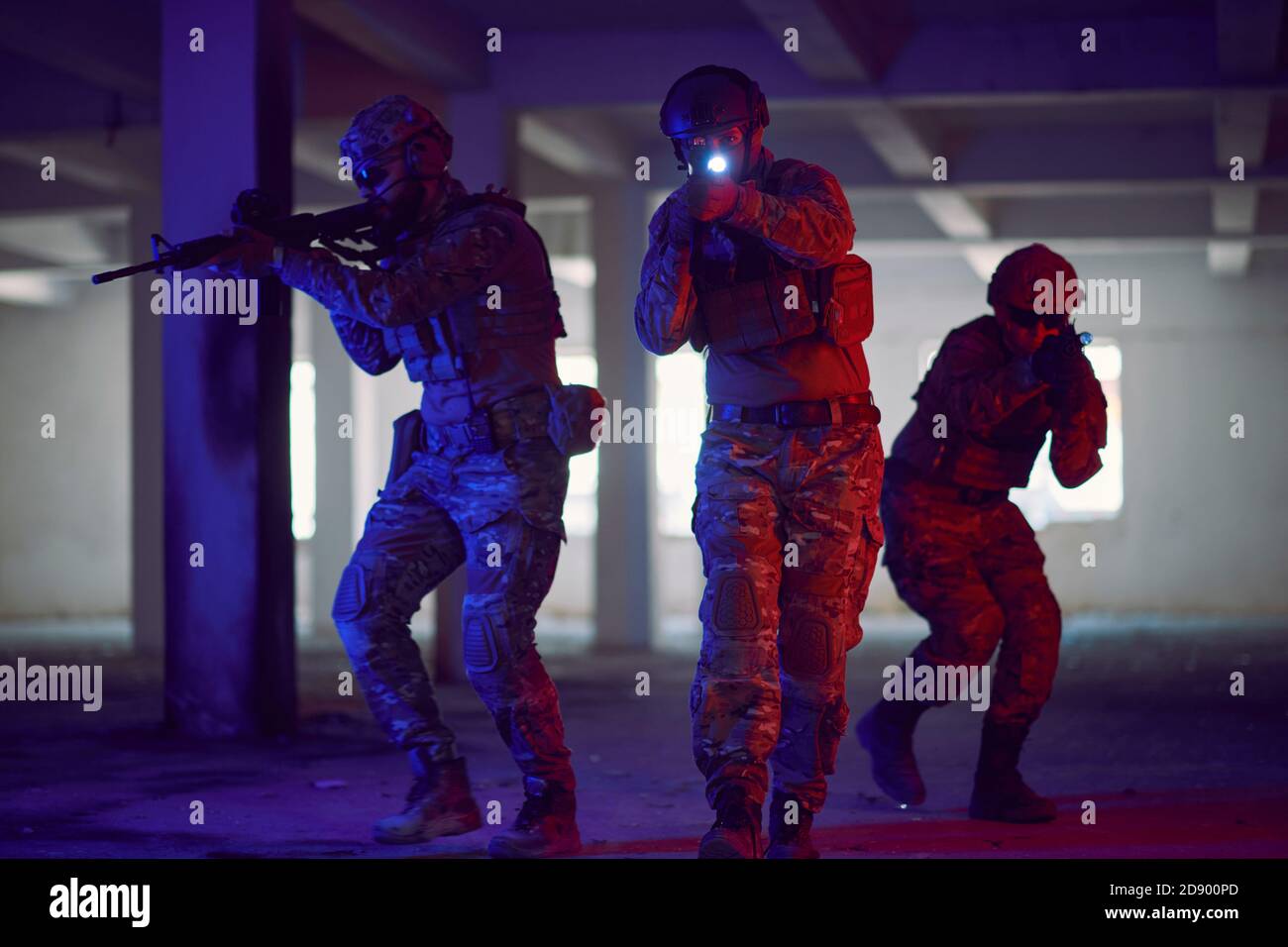 Soldiers squad in tactical formation having action urban environment ...