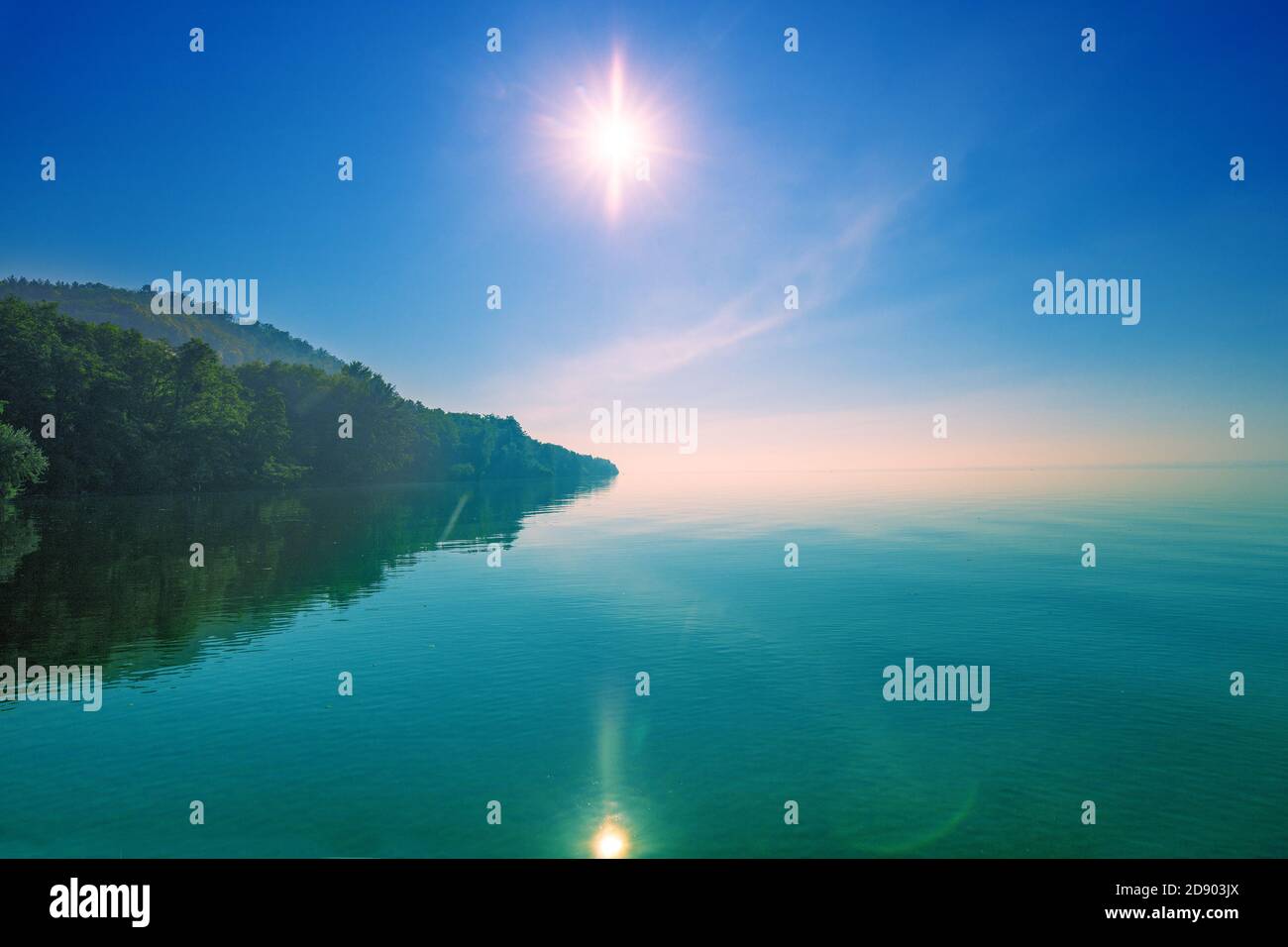 Seascape in the misty morning. Mount in the sea. Serene sea during ...