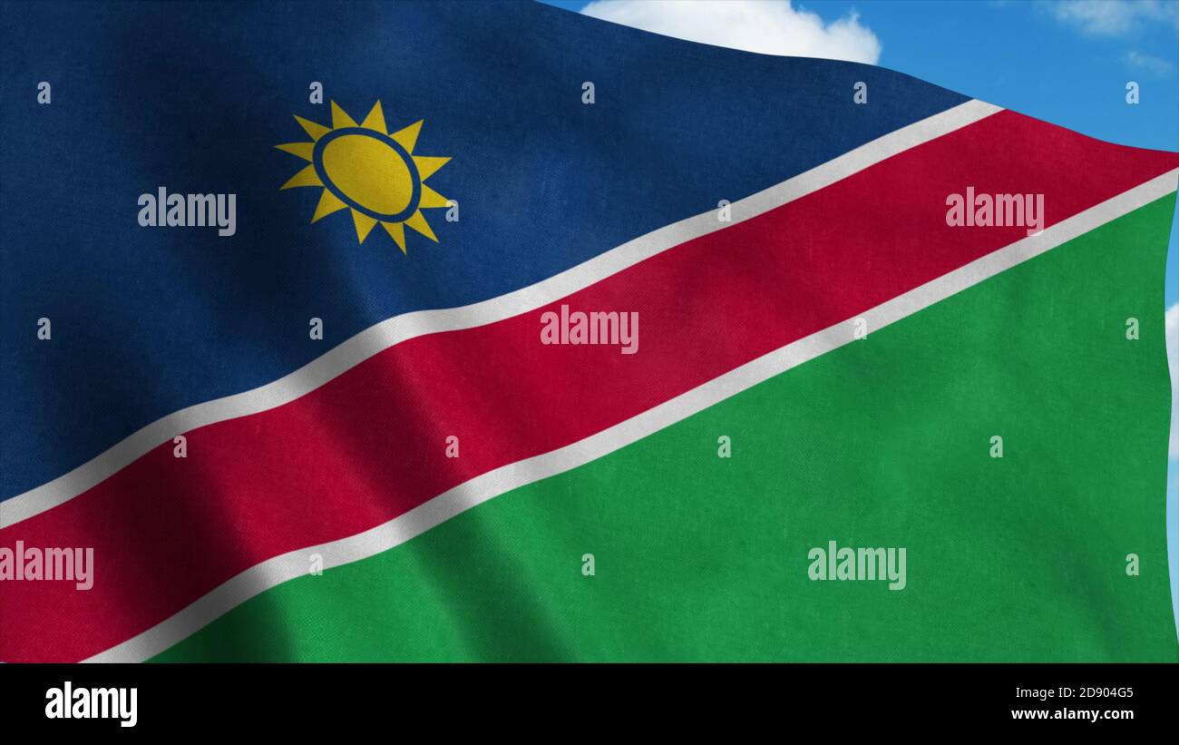 Namibia flag on a flagpole waving in the wind, blue sky background. 3d ...